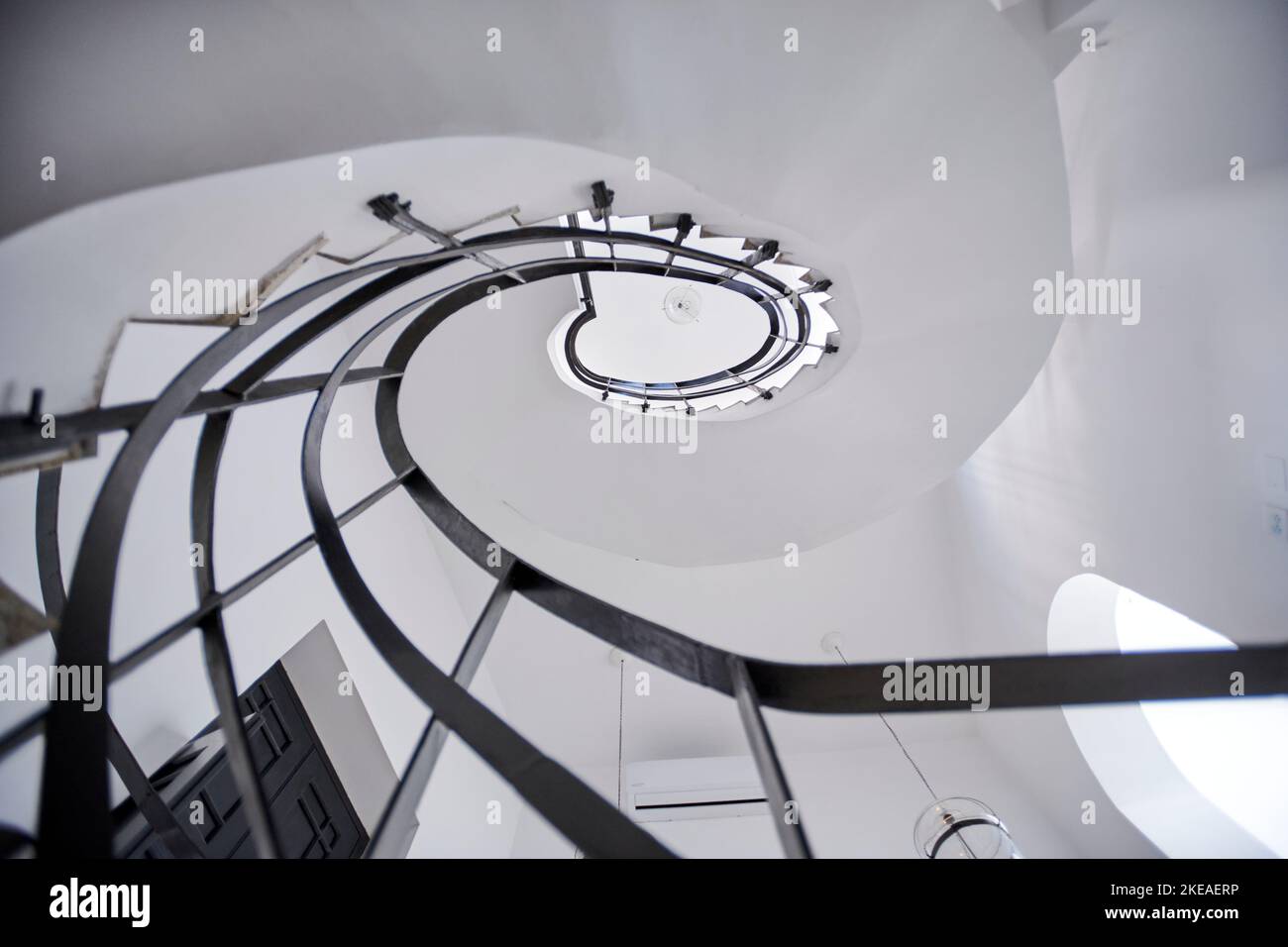 An stair combo of cement and metal with a beautiful evolvent movement ...