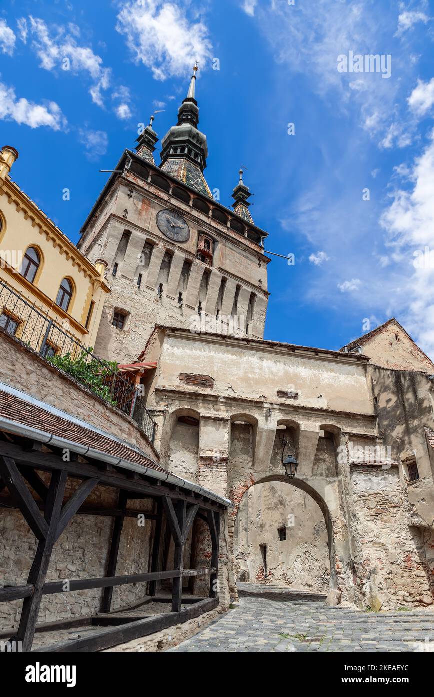 The masonry wall, cobblestone road, and entrance to the medieval ...