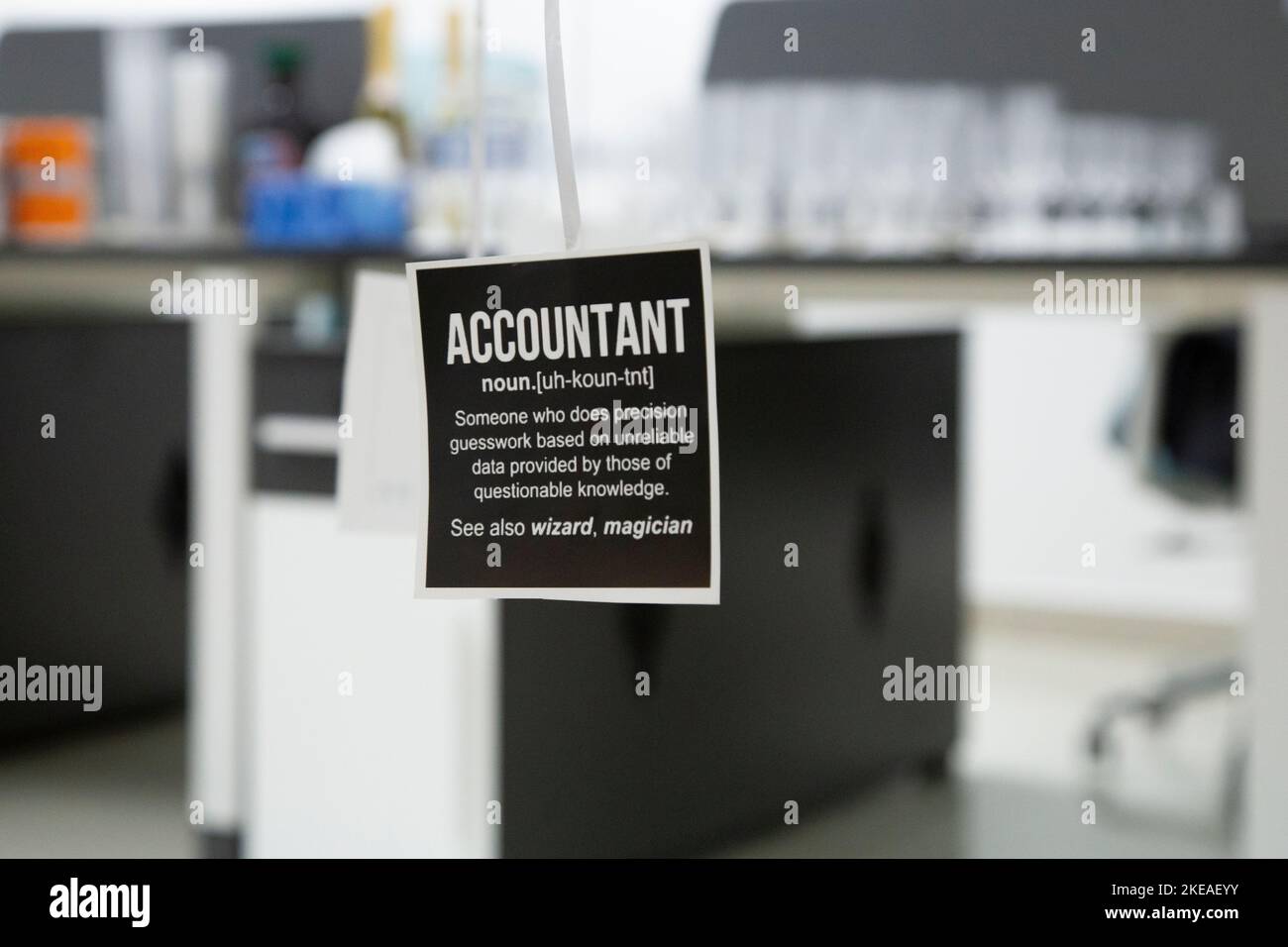 inspirational quote on string with office at back Stock Photo - Alamy
