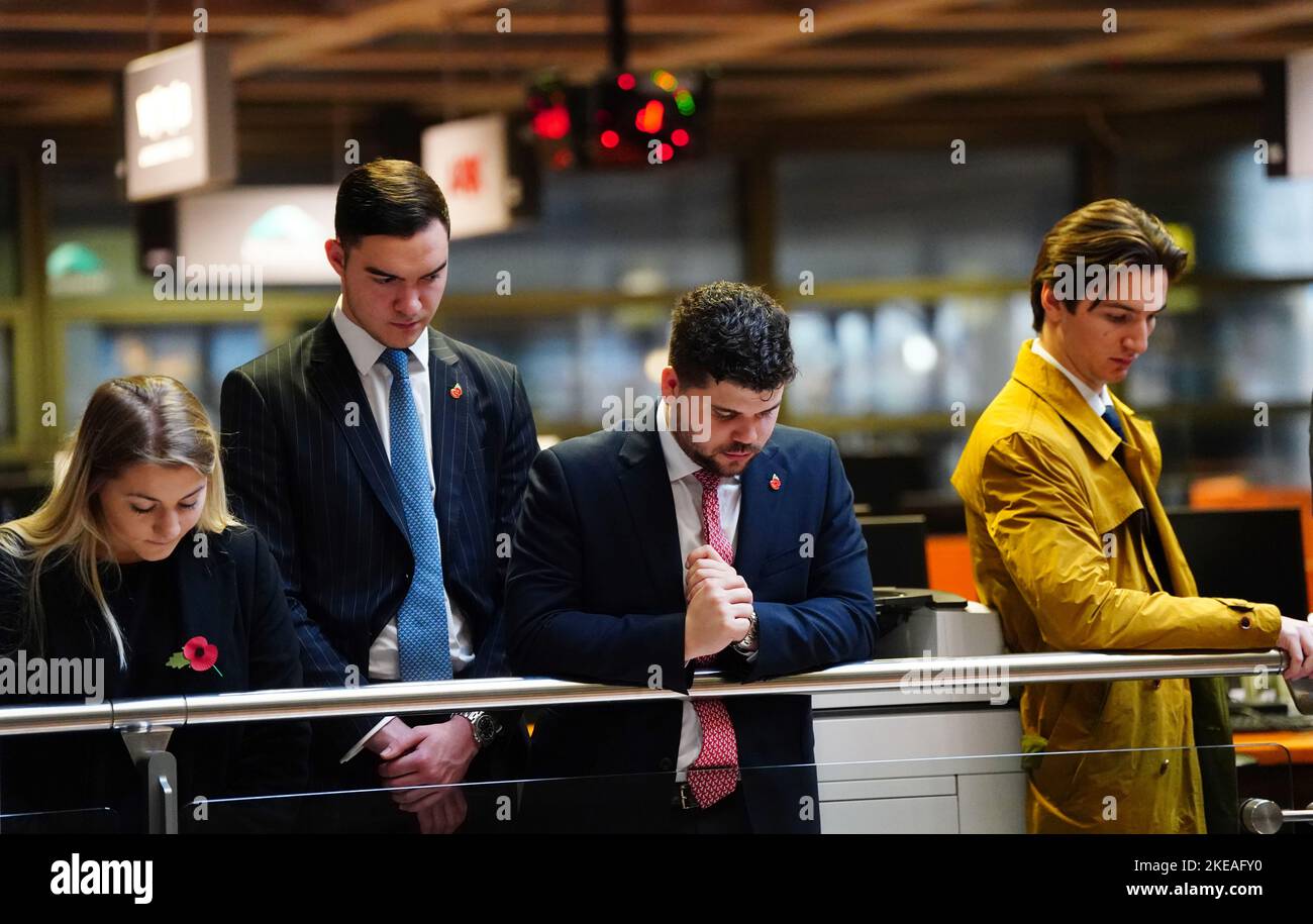 City workers at a Remembrance Day ceremony at Lloyd's of London, in the ...