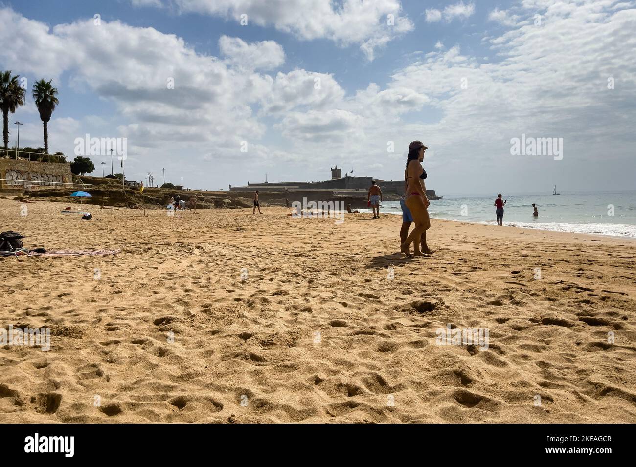People enjoying their time on the beach in Carcavelos Stock Photo - Alamy