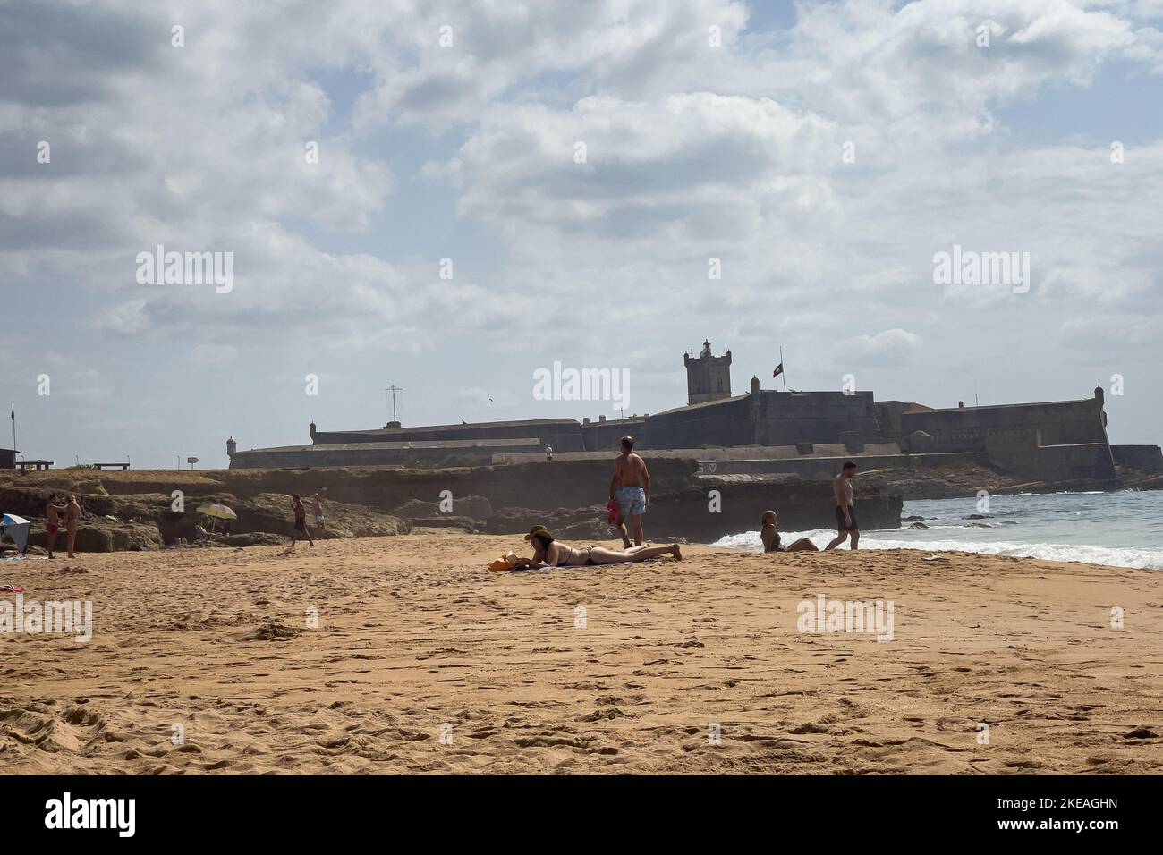 People enjoying their time on the beach in Carcavelos Stock Photo - Alamy