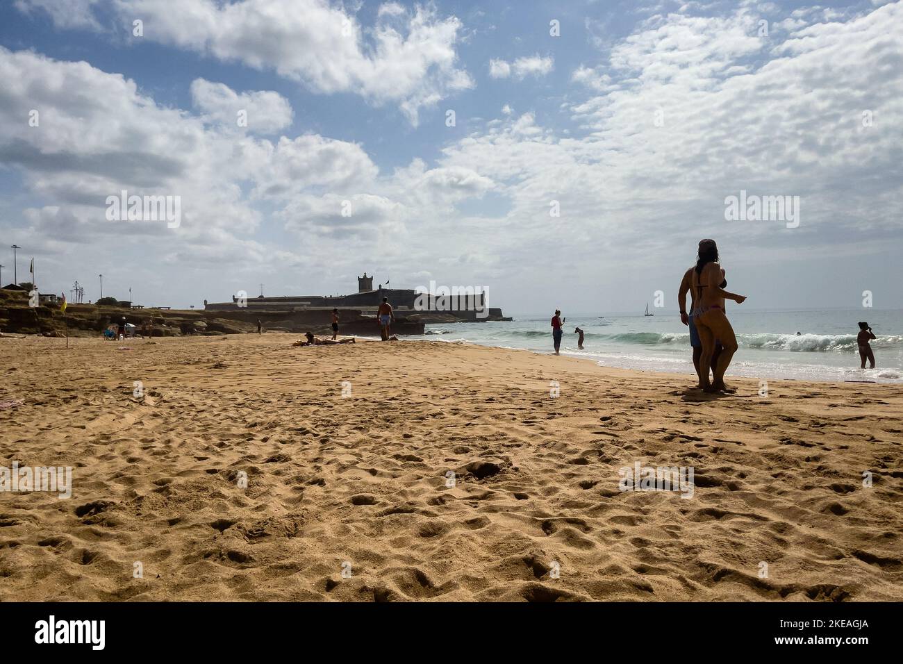 People enjoying their time on the beach in Carcavelos Stock Photo - Alamy
