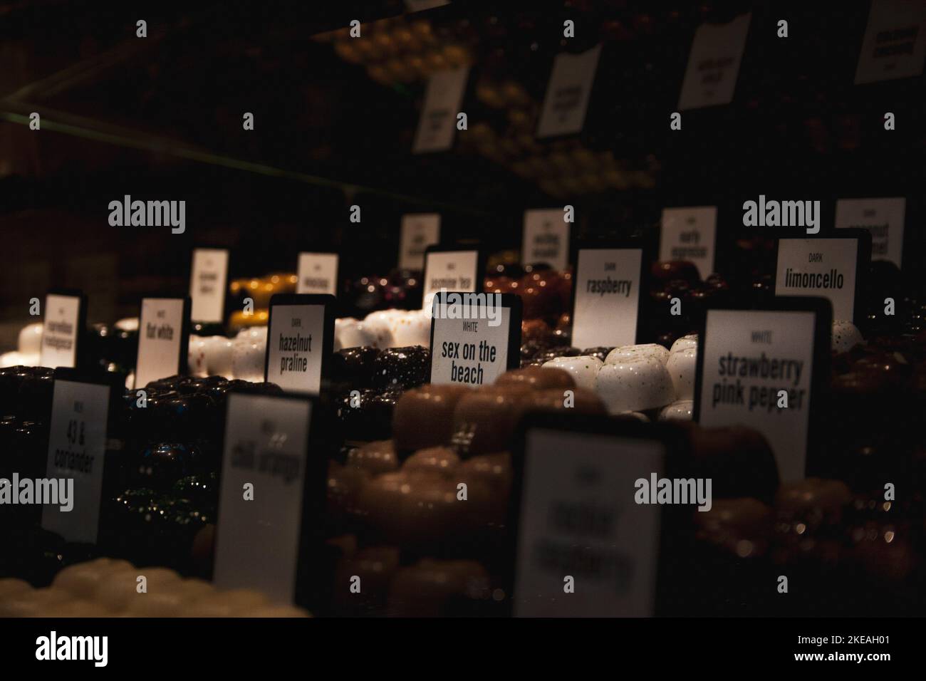 A close-up shot of different flavored desserts with their names Stock ...