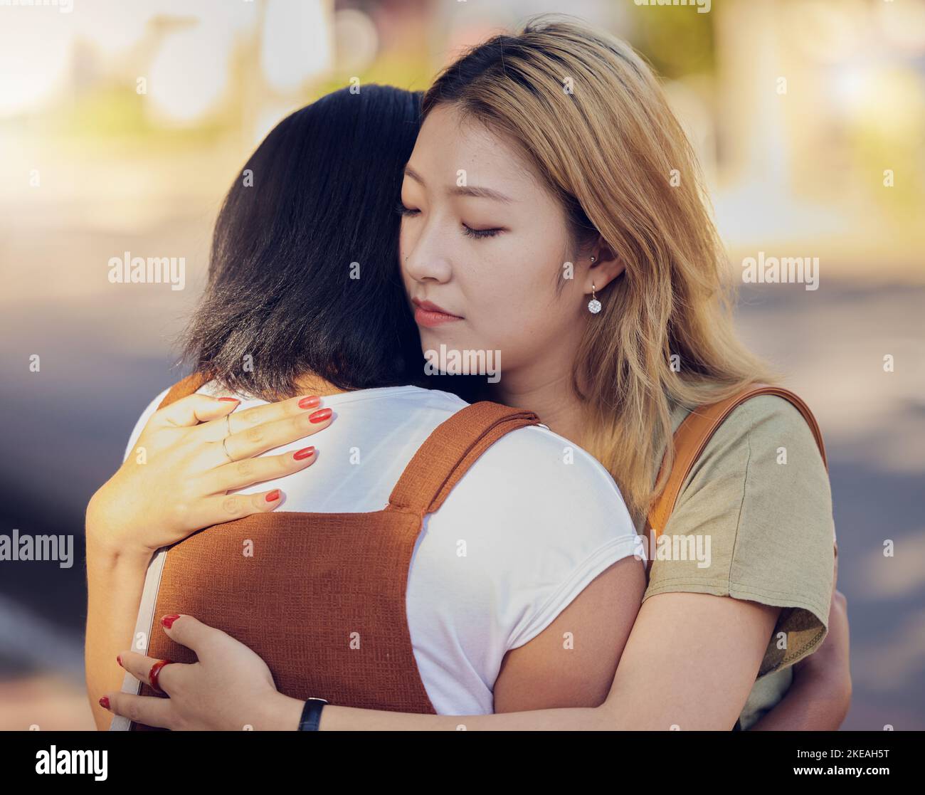 Love, women and hug for connect, sad and support for understanding with problem, compassion and ...