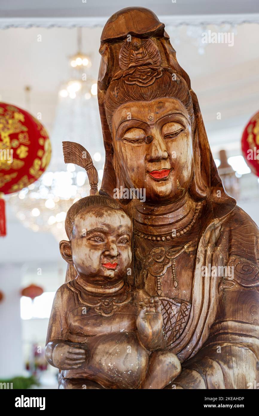 The Temple of Mercy (Guanyin) in Chiang Rai, Thailand sits on top of a ...