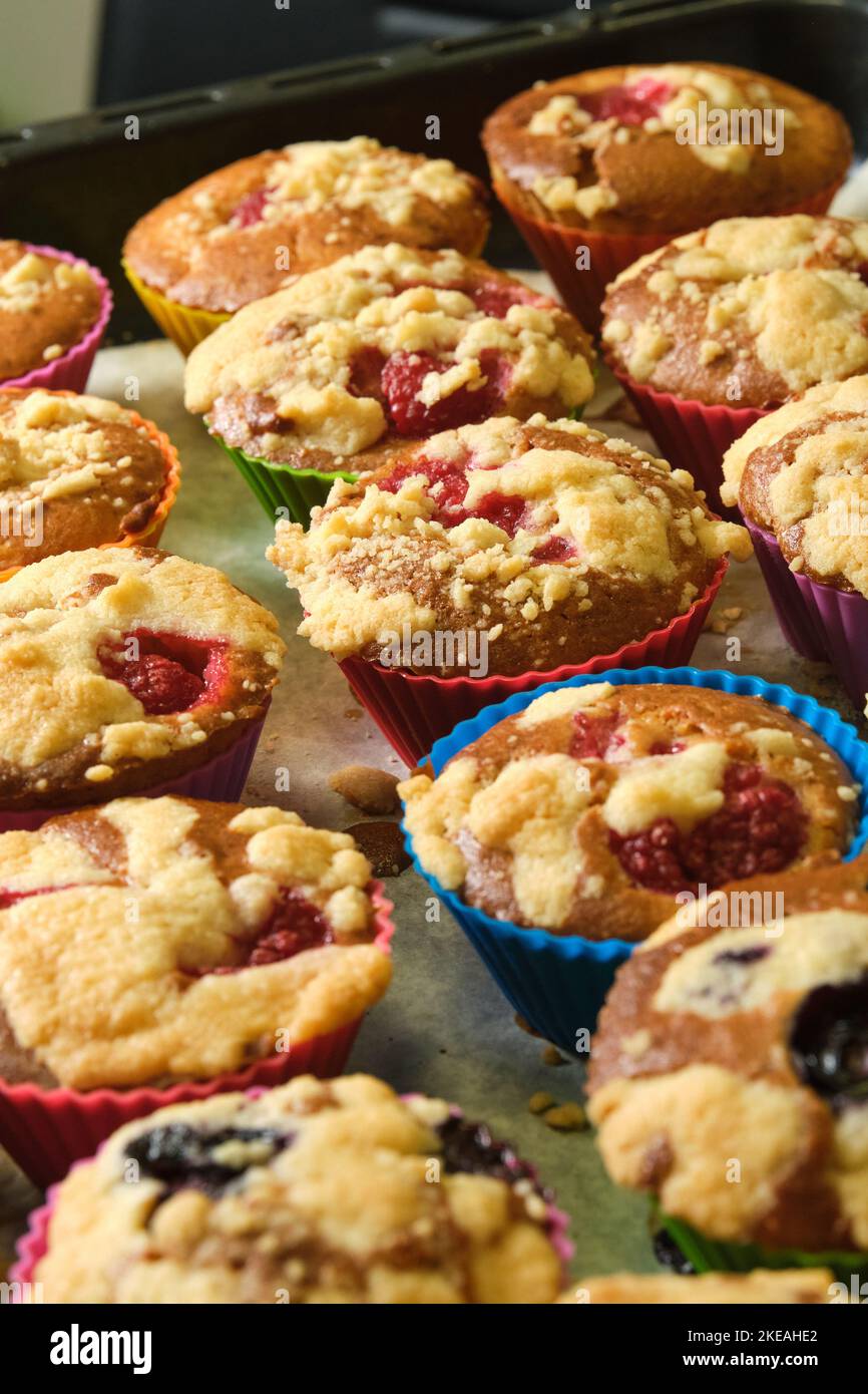 freshly baked muffins with berries Stock Photo - Alamy