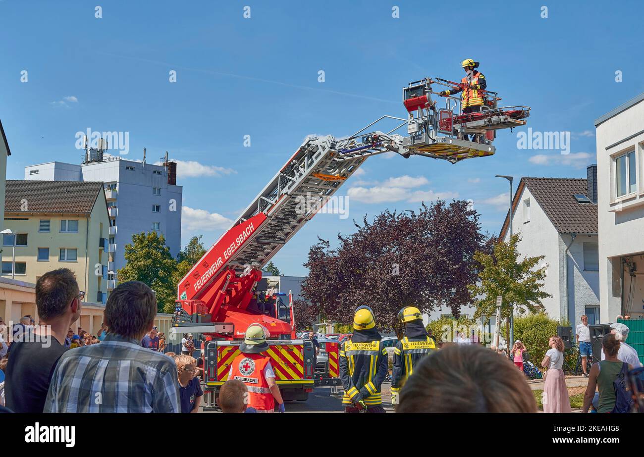fire drill, rescue of a wounded person by turnable ladder with basket ...