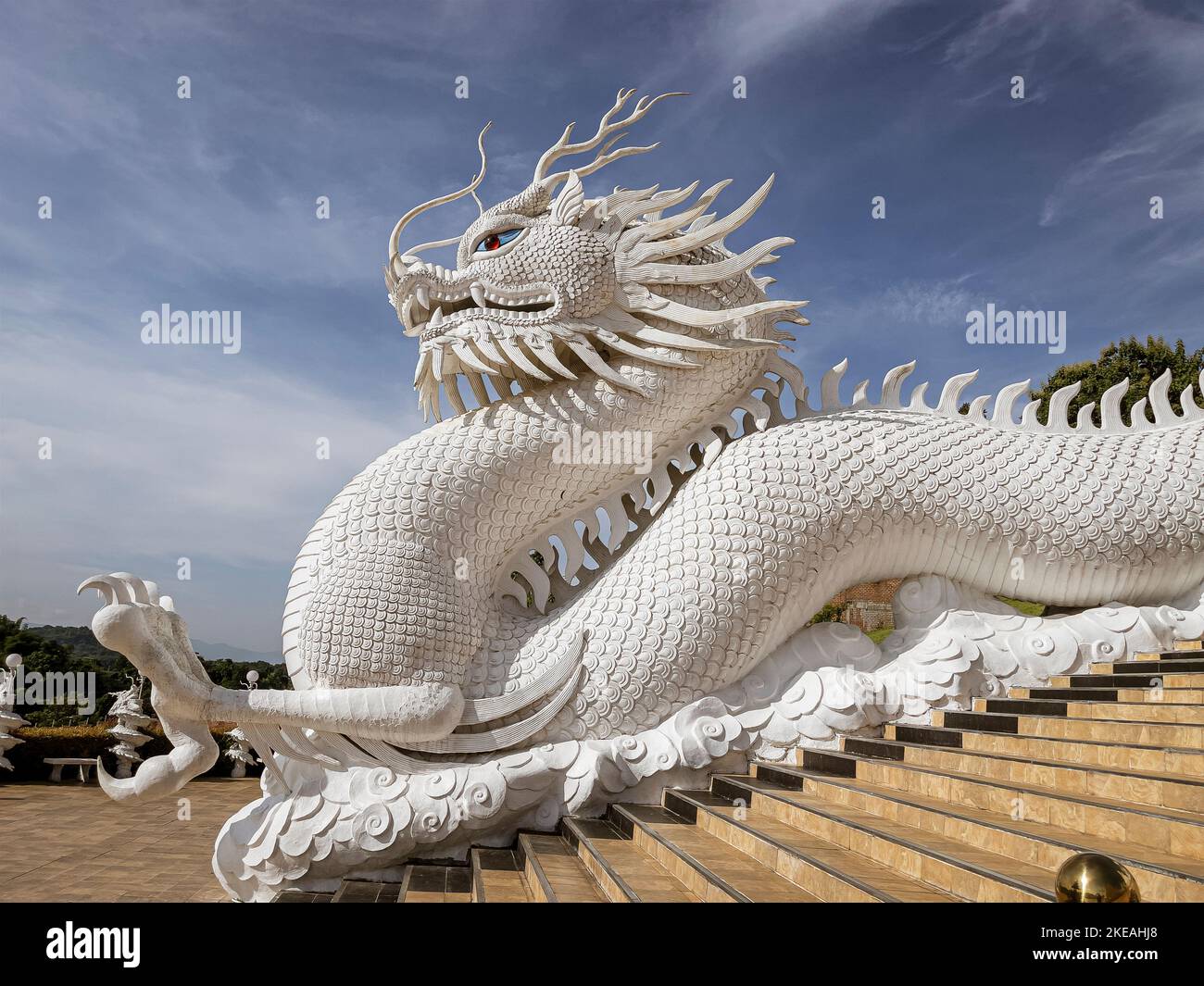 The Temple of Mercy (Guanyin) in Chiang Rai, Thailand sits on top of a ...