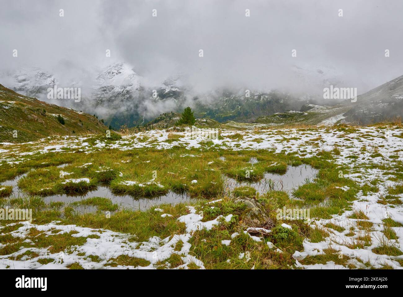 Onset of winter in late summer at the Kaunertal glacier with snowfields ...