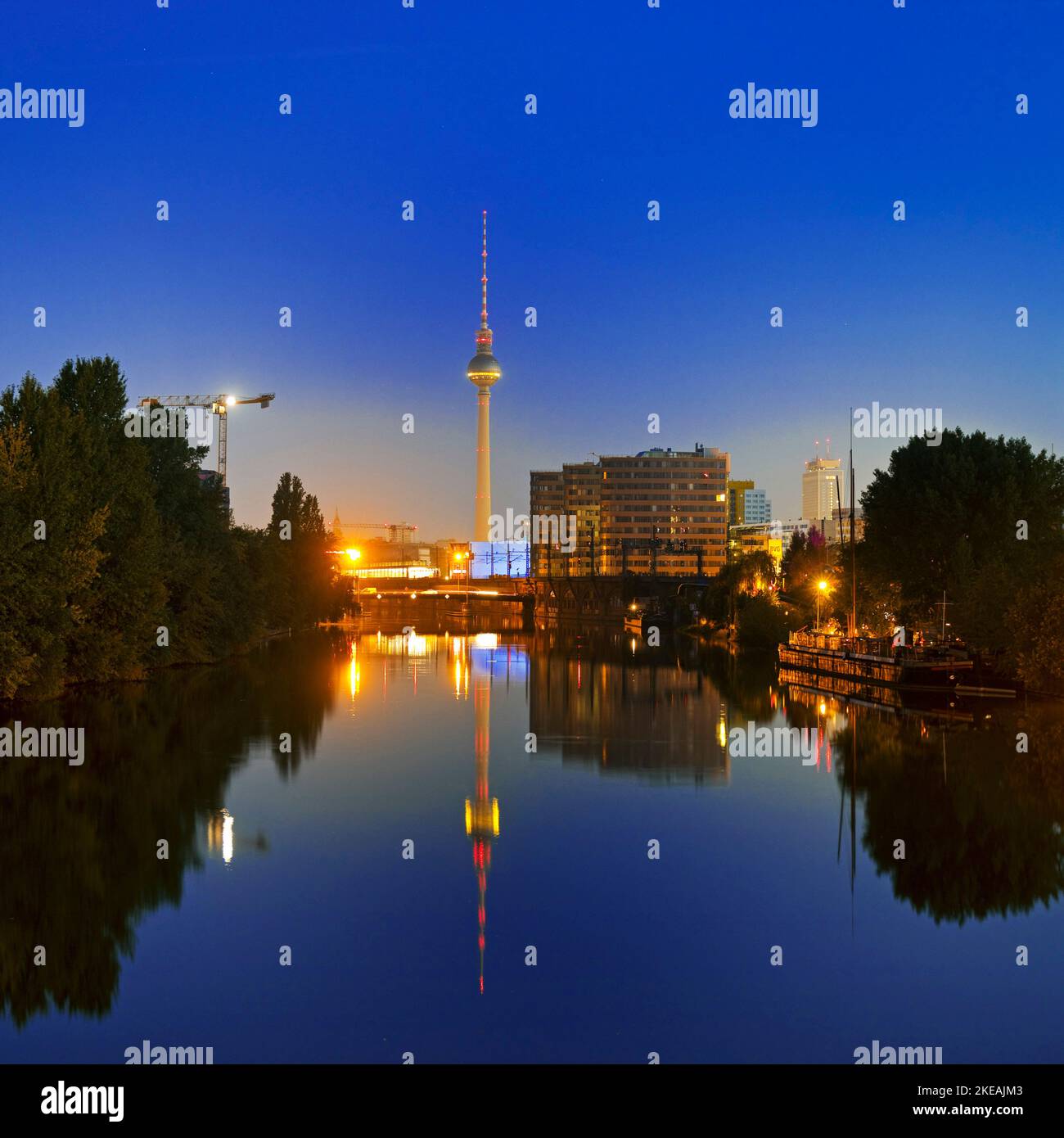 Spree with television tower seen from Schilling Bridge at twilight ...