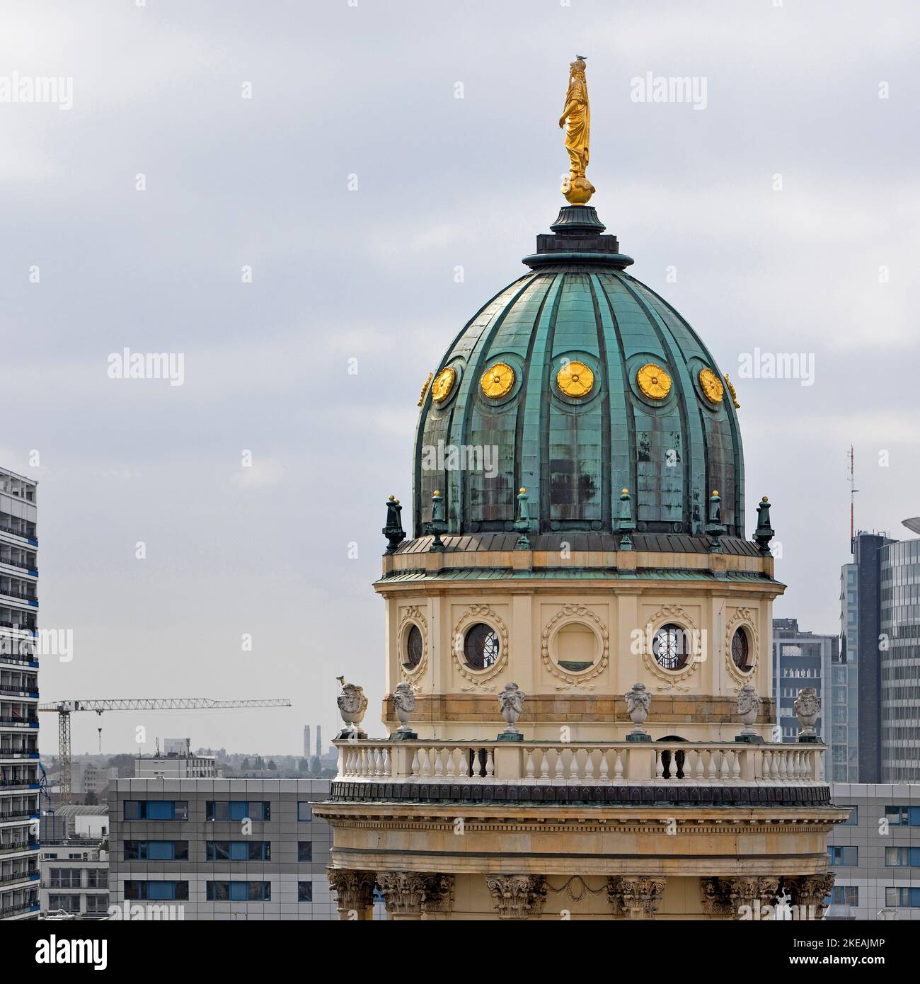 dome tower of the New Church on Gendarmenmarkt in front of newly built ...