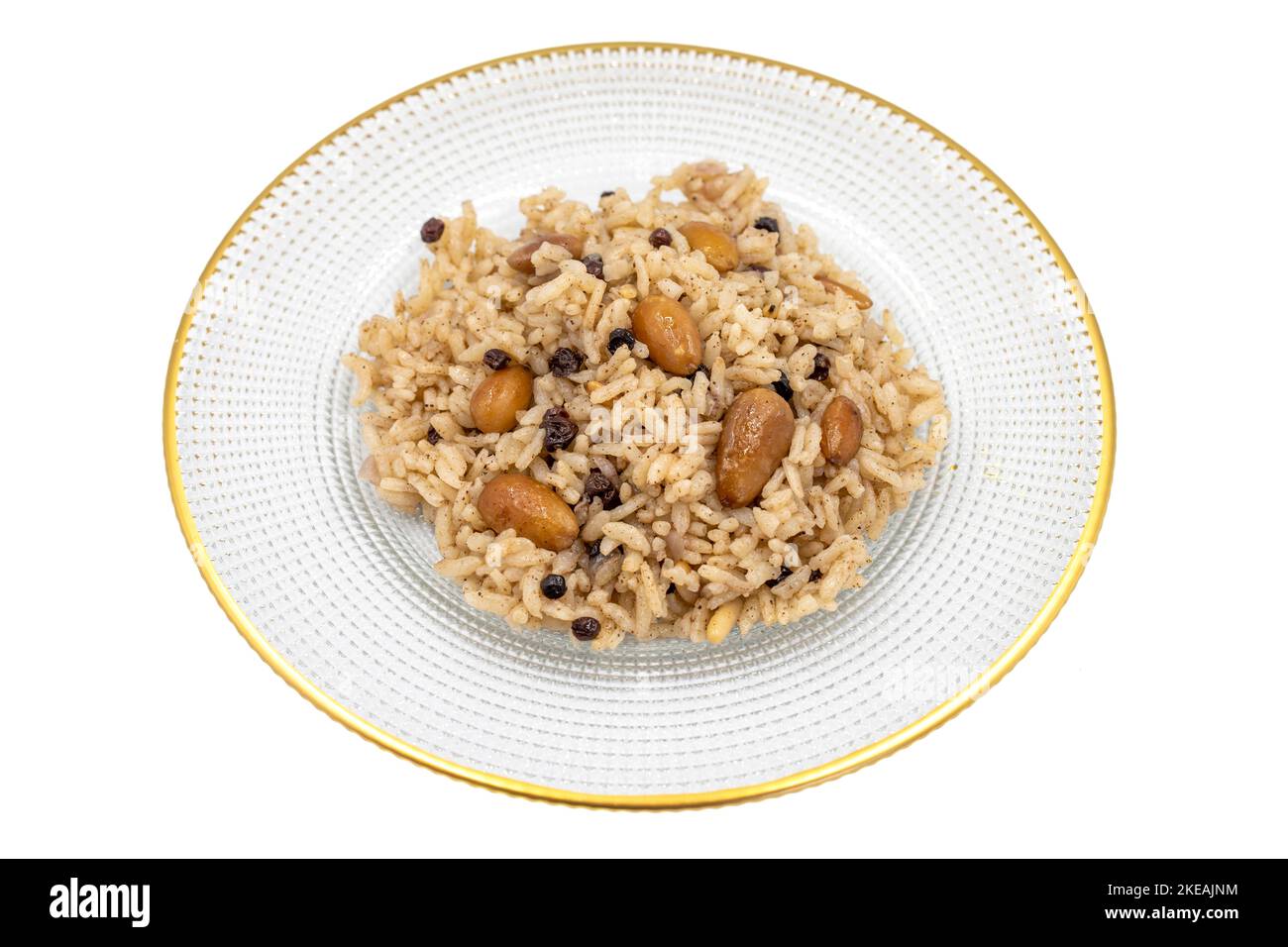 Rice with currants and almonds on a white background. Traditional ...