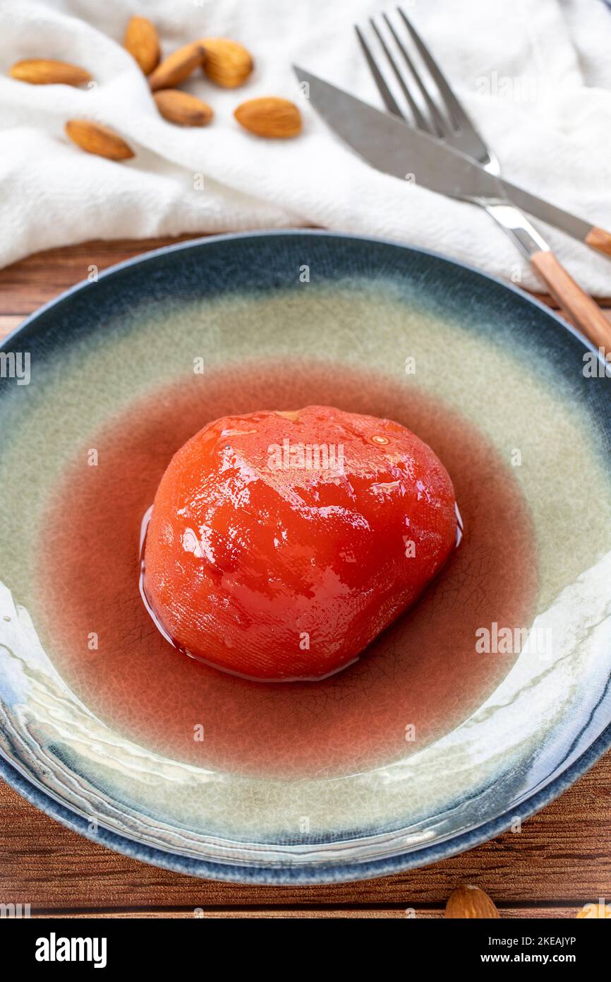 Turkish quince dessert on wood floor. Traditional Turkish cuisine ...