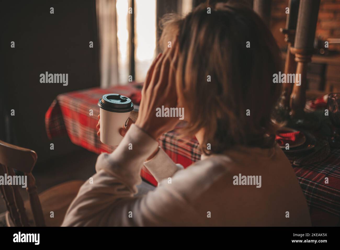 Young teen boy with long hair thoughtful look sad eyes negative mood ...