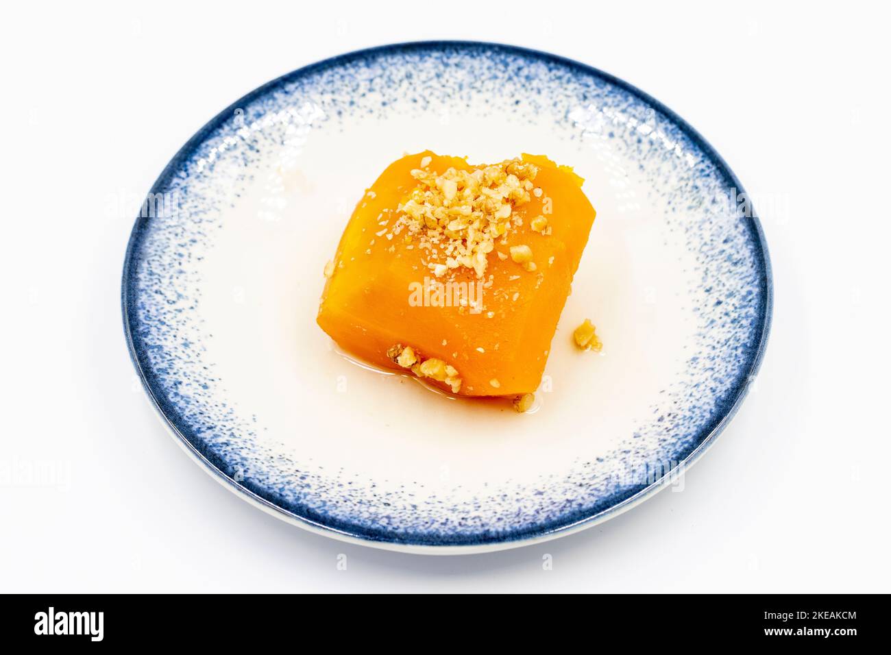 Pumpkin dessert on a white background. Traditional Turkish cuisine ...