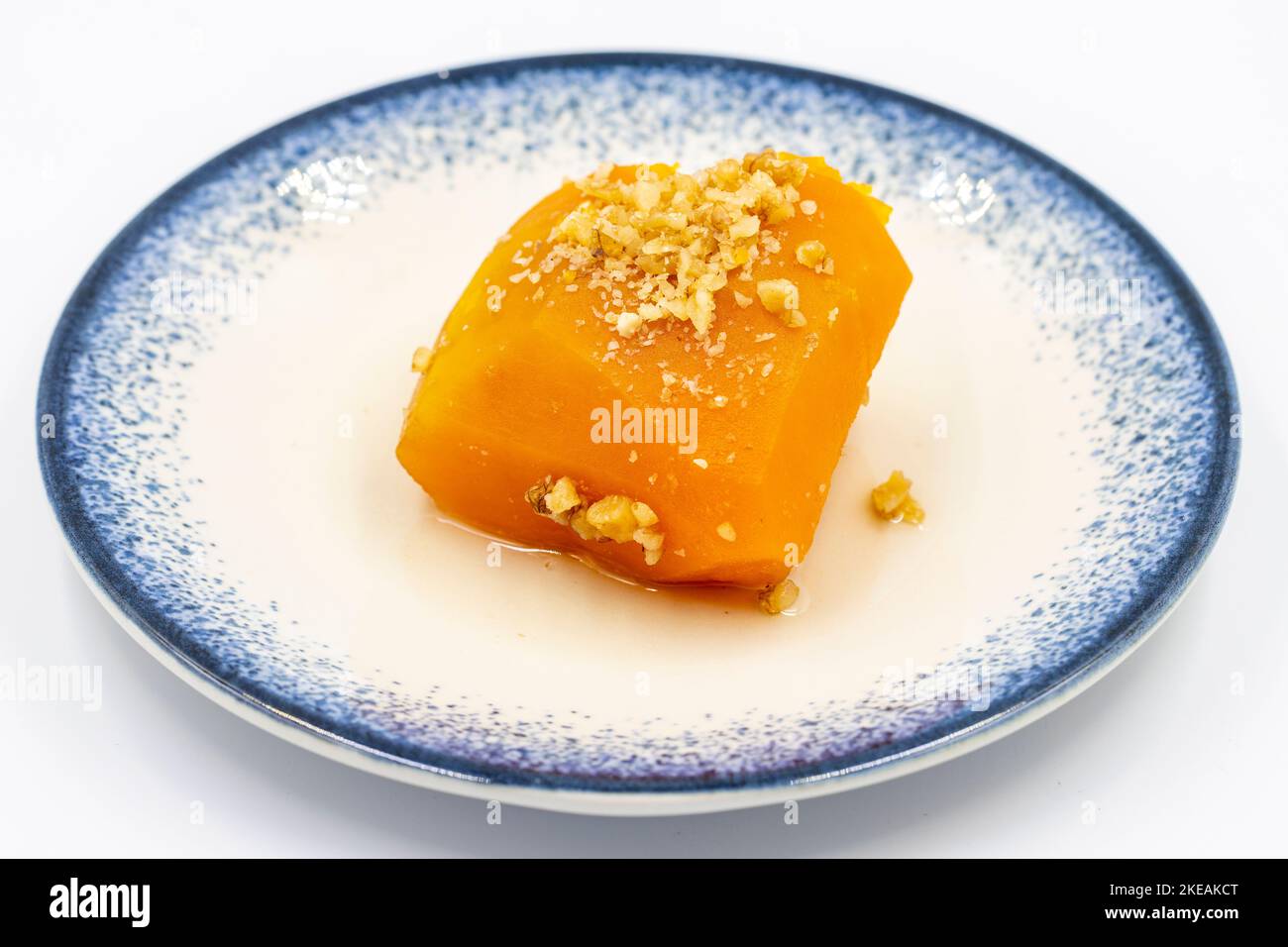 Pumpkin dessert on a white background. Traditional Turkish cuisine ...