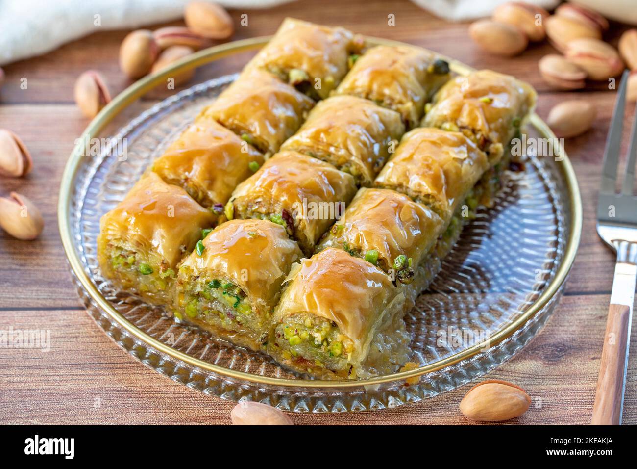 Pistachio baklava. Close-up baklava isolated on wood background ...