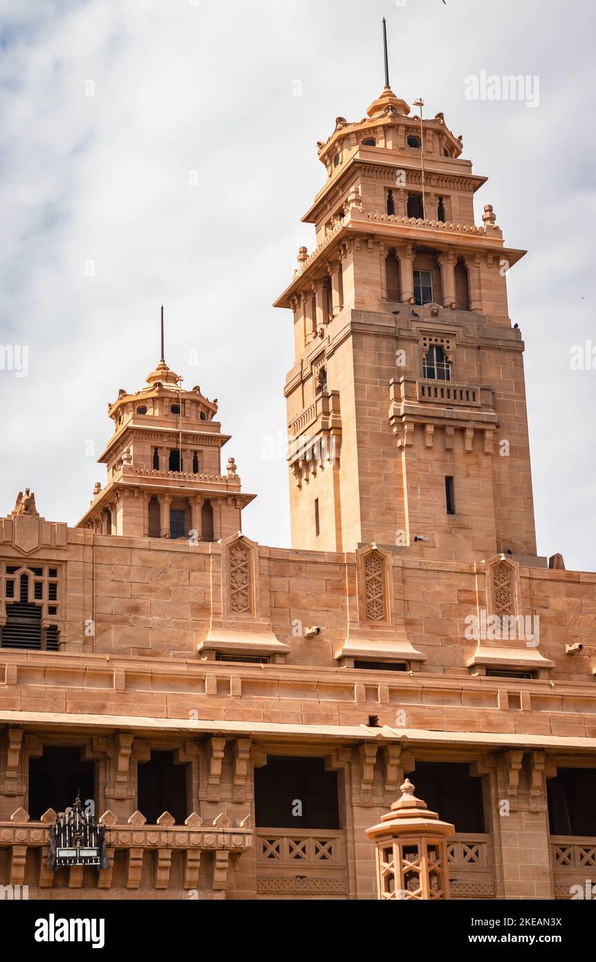 vintage king place tower with bright sky from flat angle image is taken ...