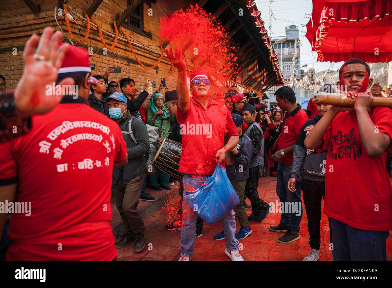 Kathmandu, Nepal. 11th Nov, 2022. A man hurls vermillion colors in the ...