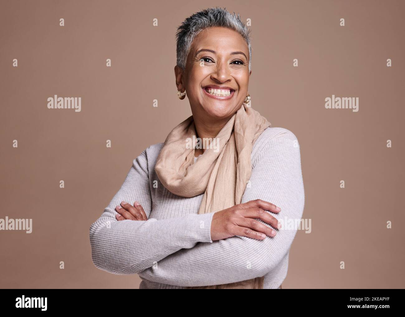 Happy elderly woman, smile and arms crossed in satisfaction for dental ...