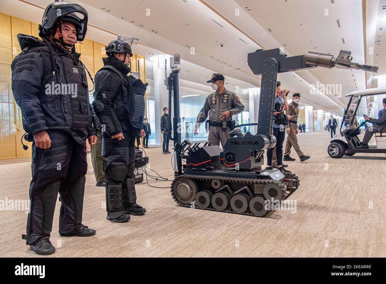 Members of the Explosive Ordnance Disposal (EOD) unit seen stand on ...