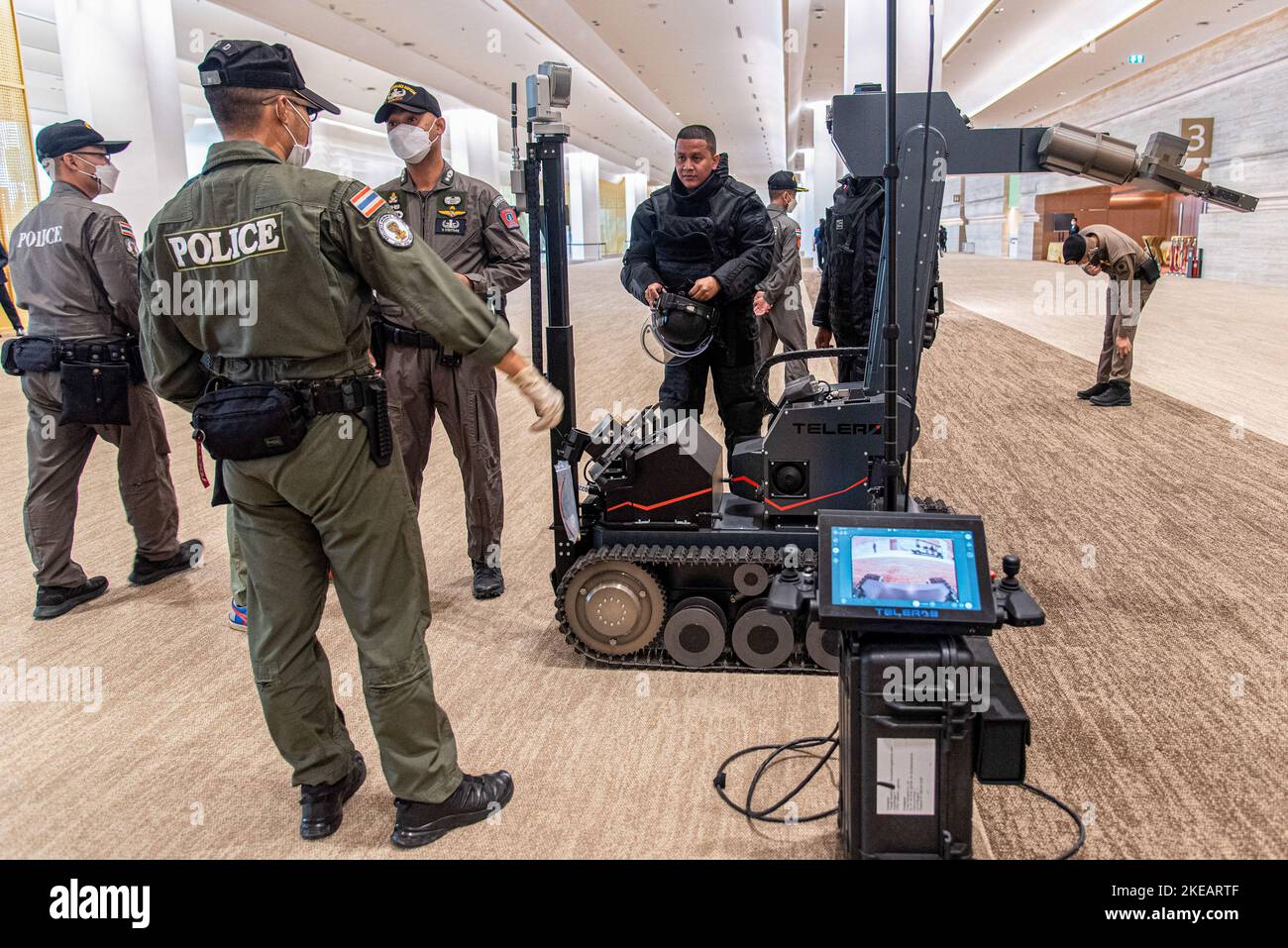 Members of the Explosive Ordnance Disposal (EOD) unit seen control a ...
