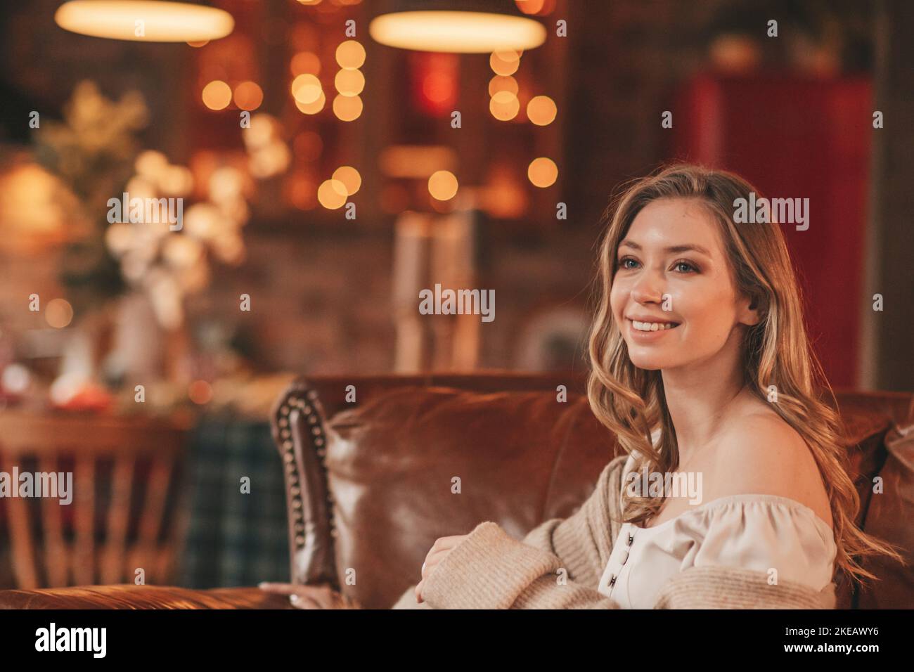 Portrait of young lovely couple hugging indoor eve 25 December with ...