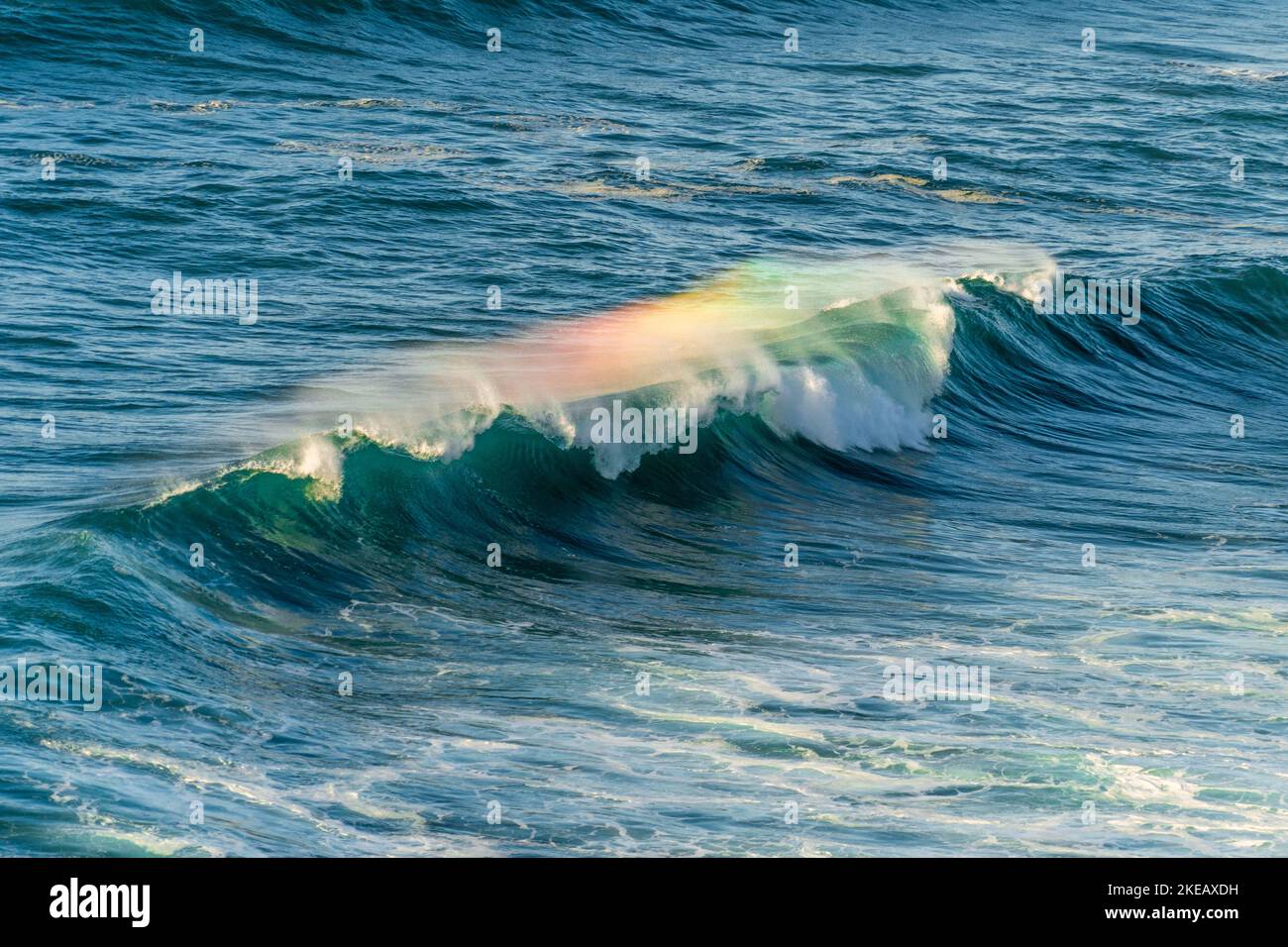 Colorful Ocean Waves. Rainbow colors in the sea at sunset background ...
