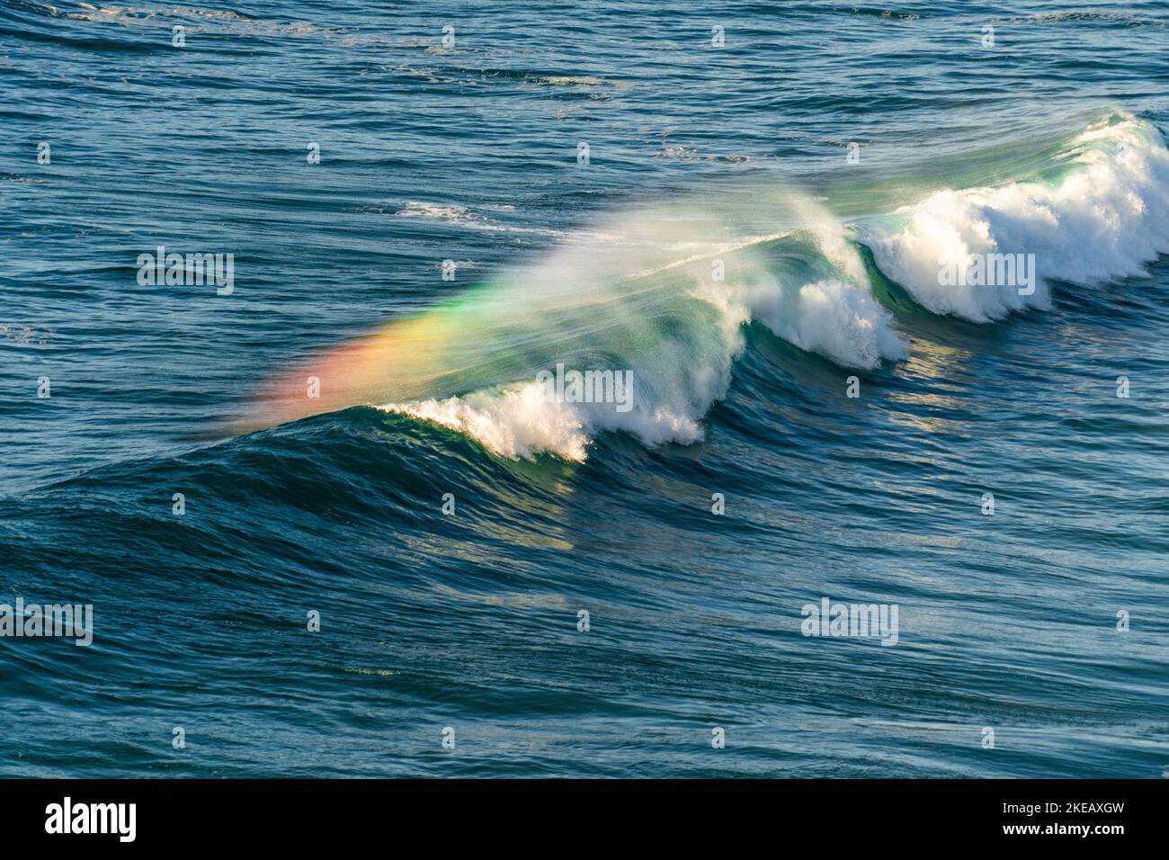 Colorful Ocean Waves. Rainbow colors in the sea at sunset background ...