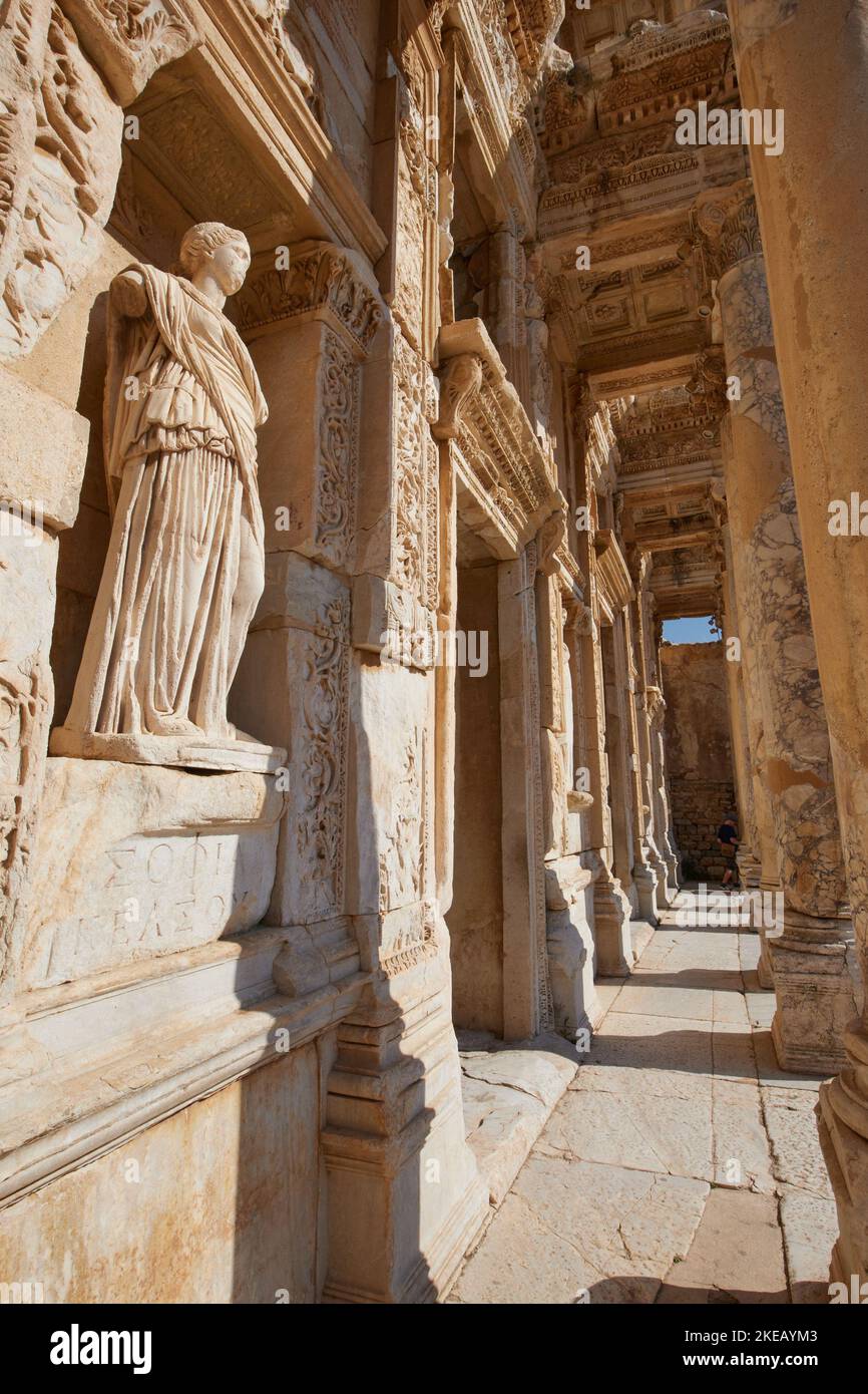 A statue in Celsus library in ancient city of Ephesus or Efes in Turkey ...