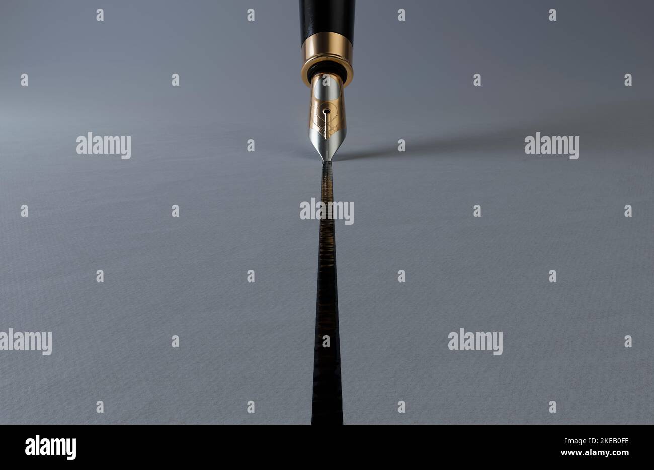 A closeup view of an ornate fountain pen drawing a straight ink line on ...