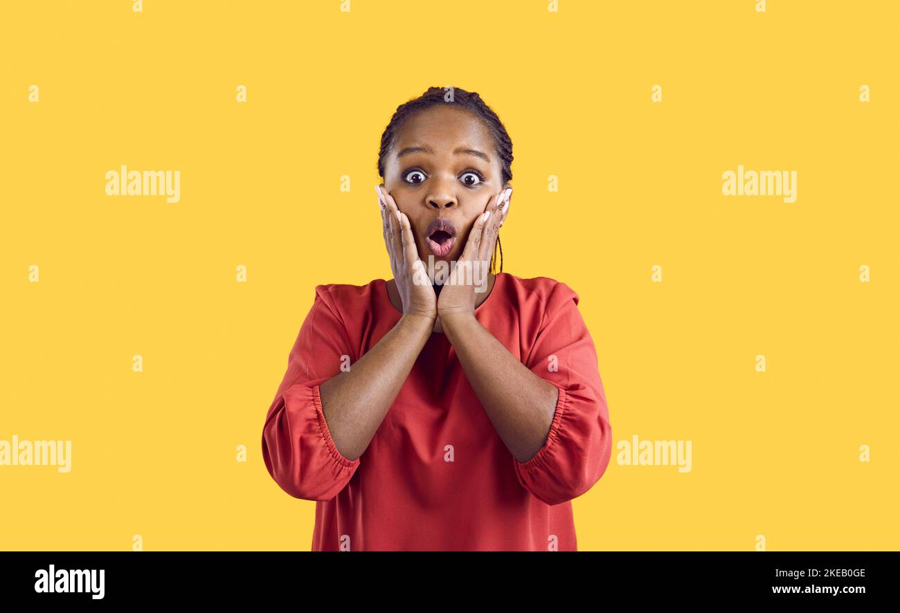 Amazed surprised woman looking at you with open mouth and big eyes on ...