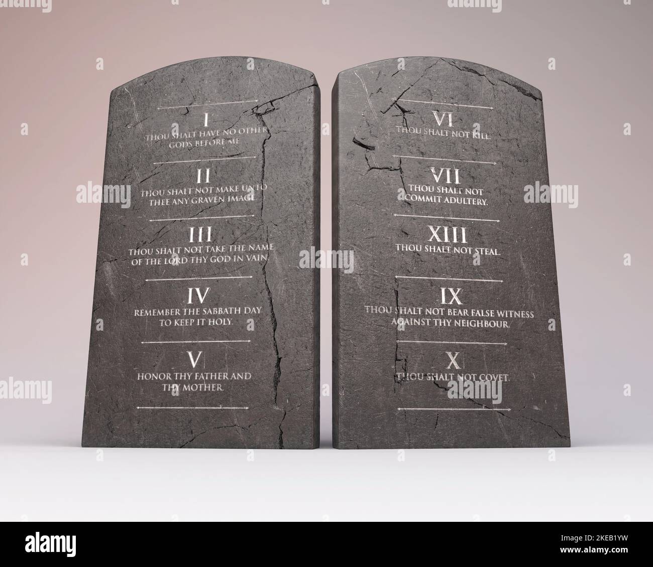 Two cracked stone tablets with the ten commandments etched into them on ...