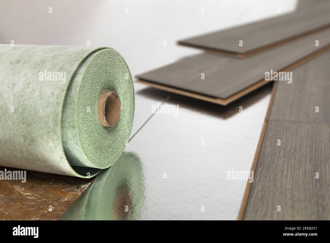 Installation of floating floor, underlay with sheets of laminate. Home ...