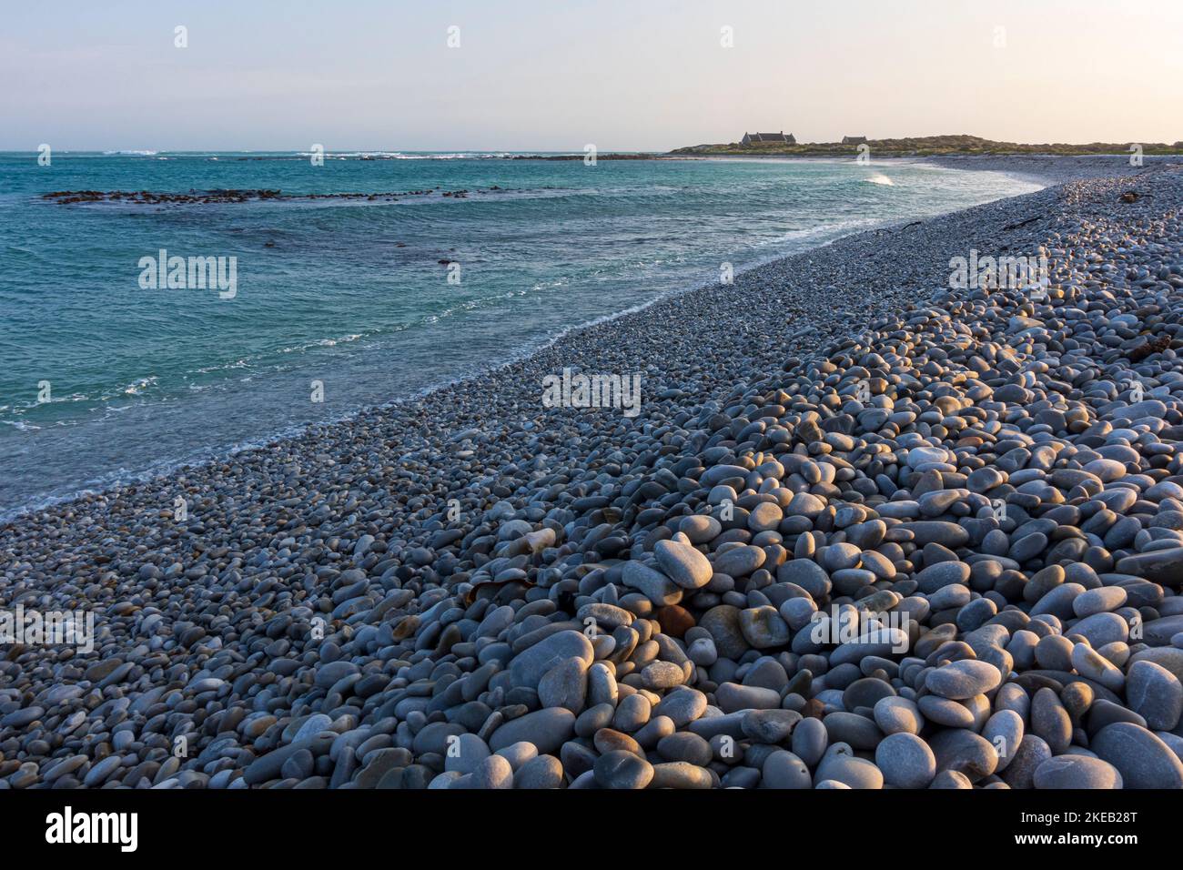 Round pebbles on a beach near Cape Agulhas. L'Agulhas in the Overberg ...