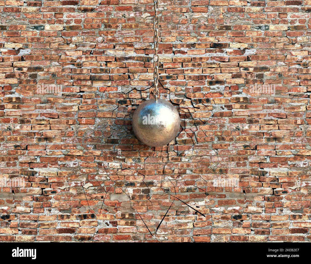 A regular metal wrecking ball attached to a chain breaking a hole in a ...