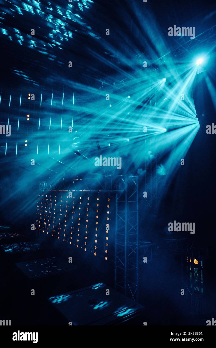 An illuminated stage with scenic spot lights Stock Photo - Alamy