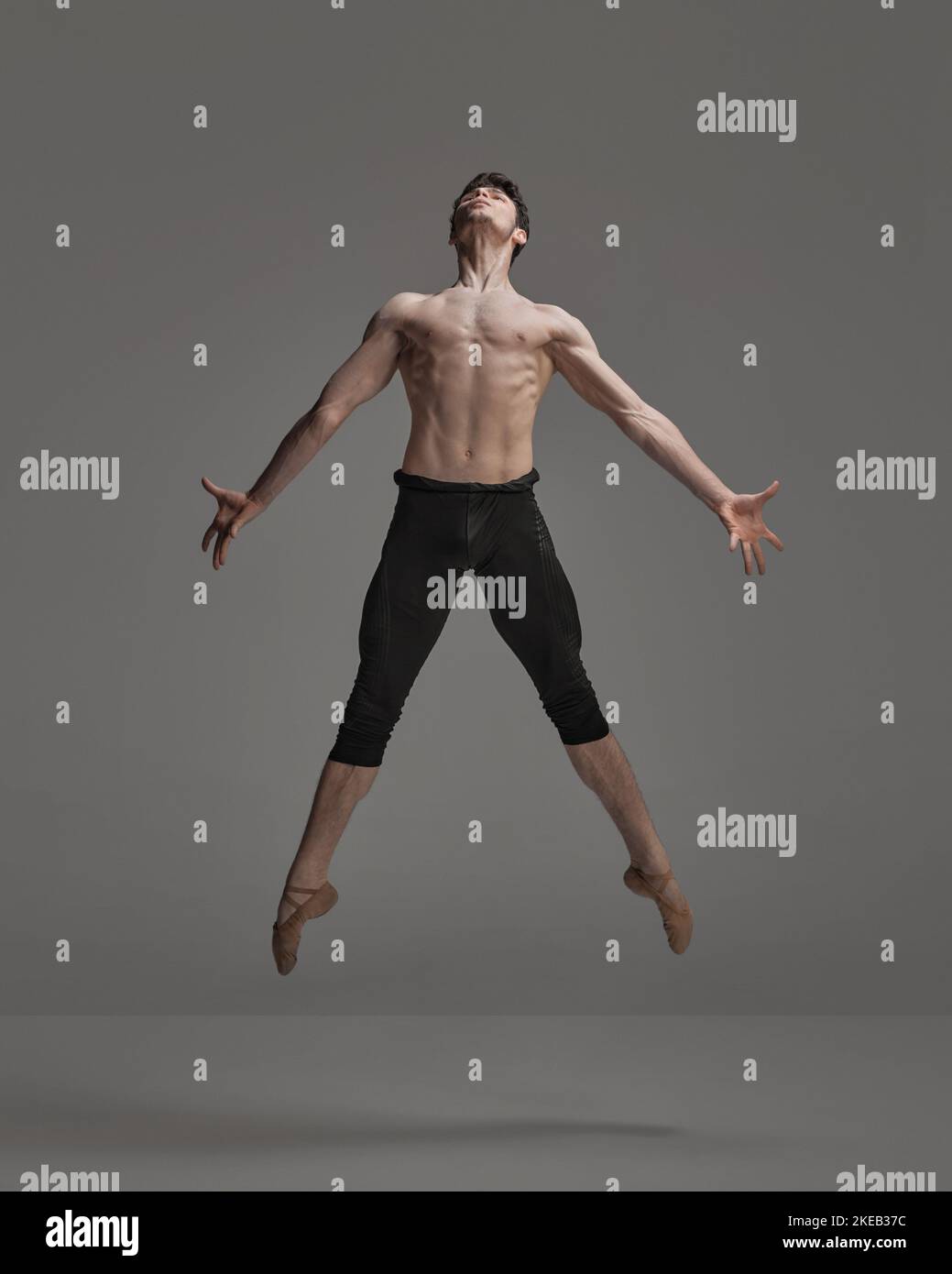 Portrait of young muscular man, ballet dancer performing isolated over ...