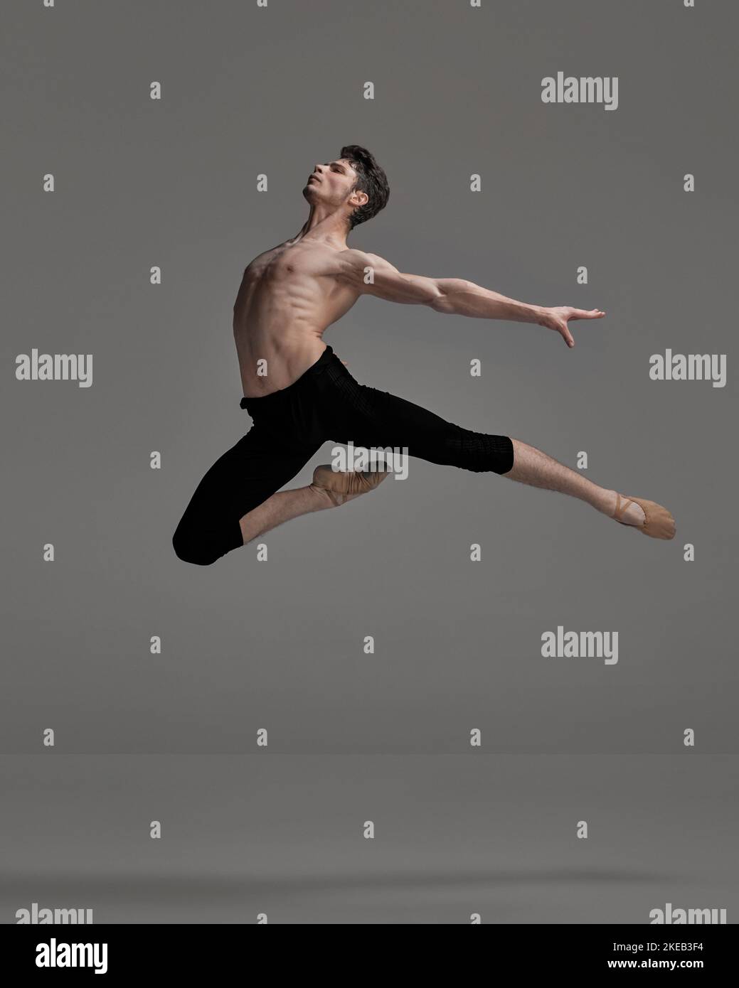 Portrait of young muscular man, ballet dancer performing isolated over ...