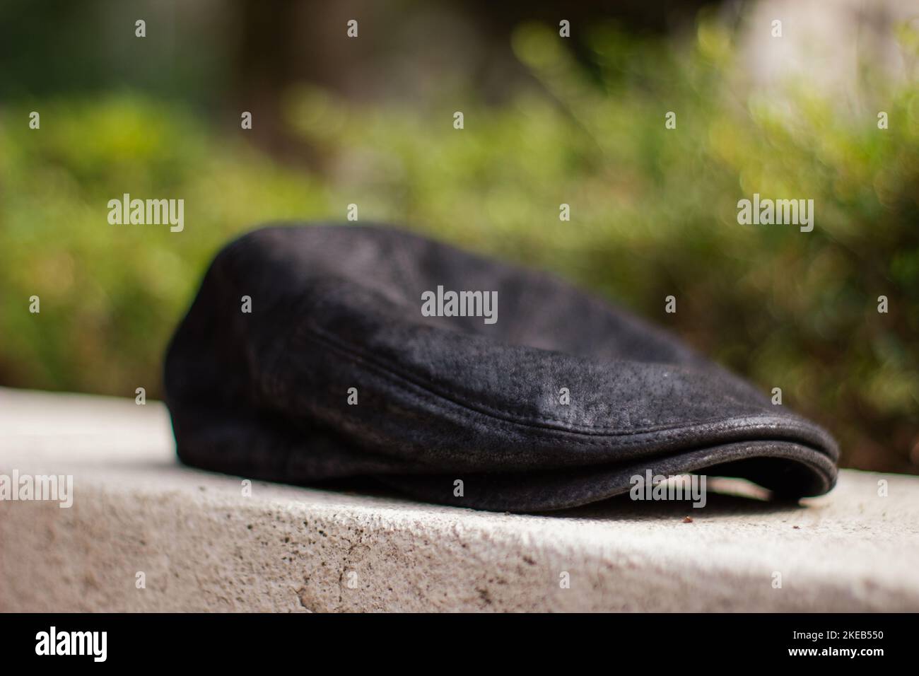 Abandoned hat on a bench in the city of Madrid Stock Photo - Alamy