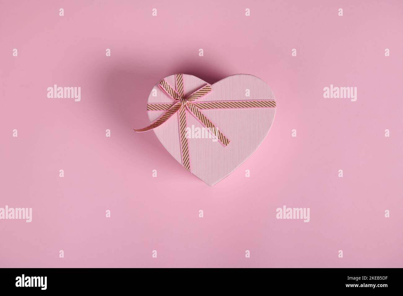 Flat lay with Valentine's Day love gift, in a heart shaped box ...