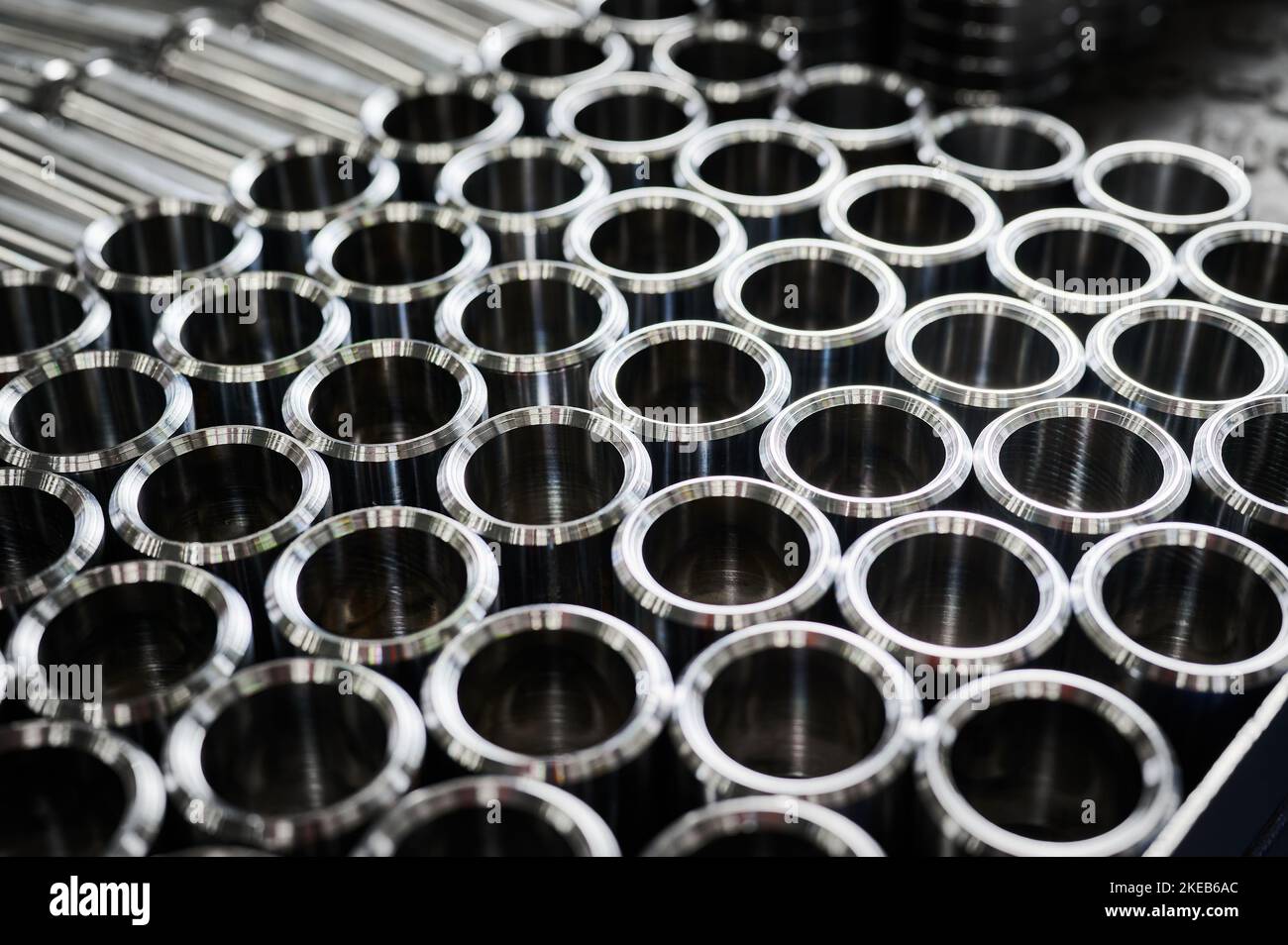 Pattern of metal hollow bars made with smart machines Stock Photo - Alamy