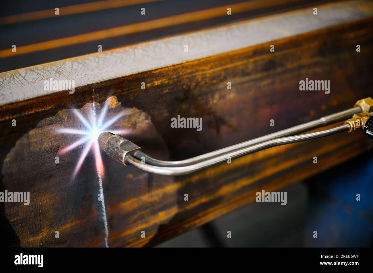 Cutting metal beam with oxy fuel cutter in plant workshop Stock Photo ...