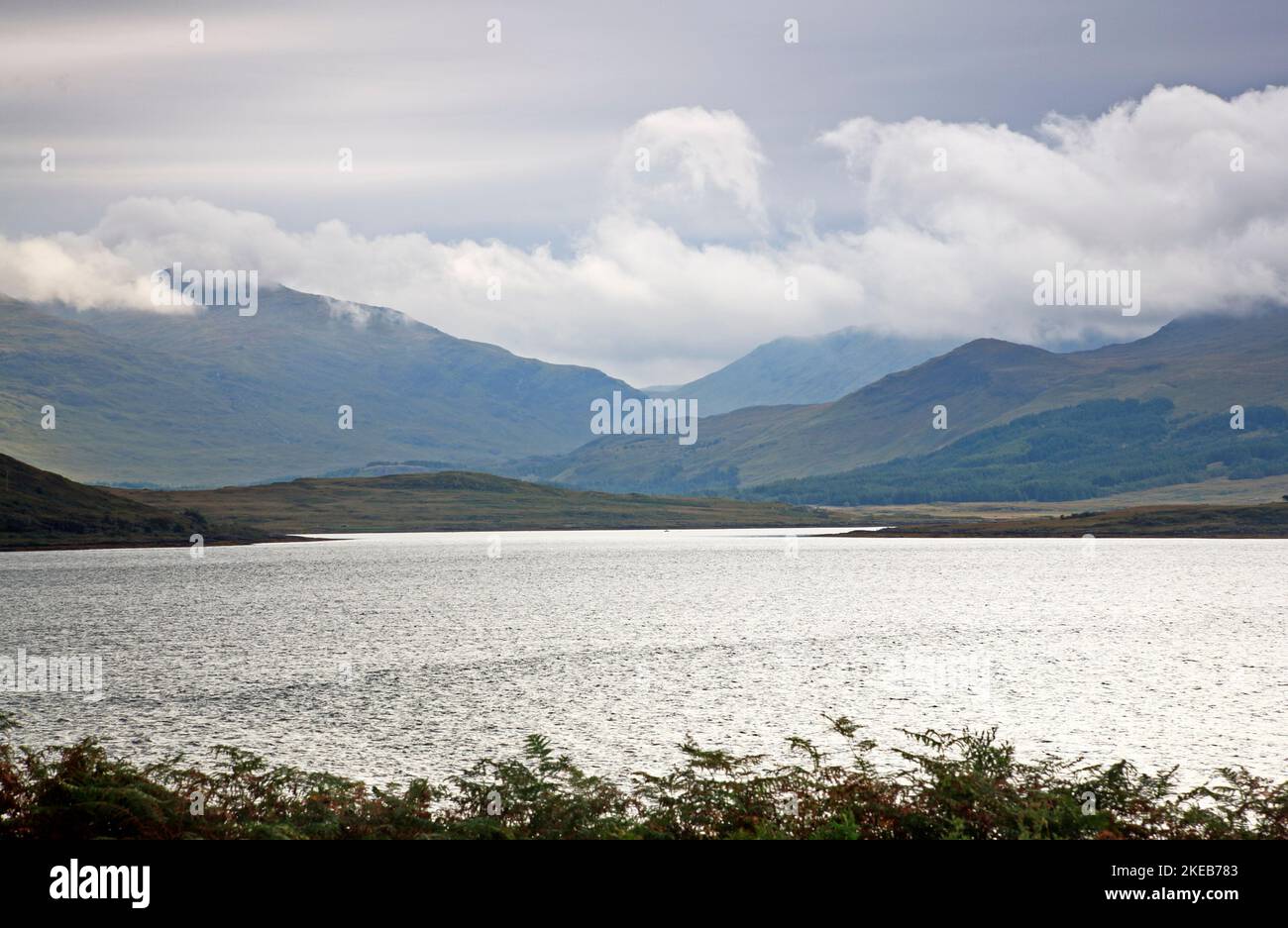 Low clouds over mountains beyond Loch Scridain and Loch Beg in autumn ...