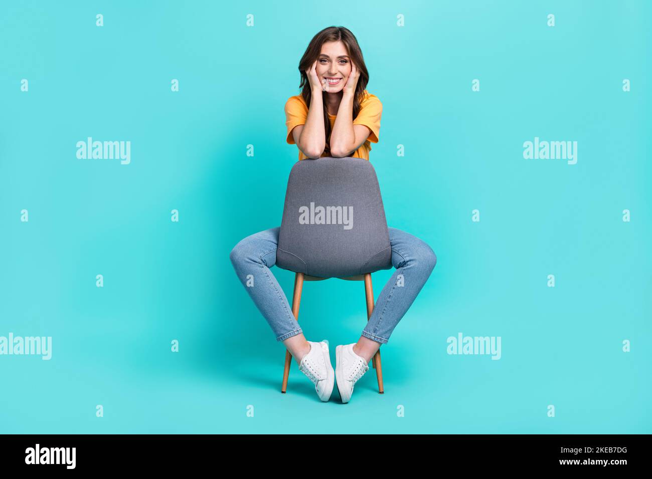 Full length photo of pretty sweet girl dressed yellow t-shirt sitting ...