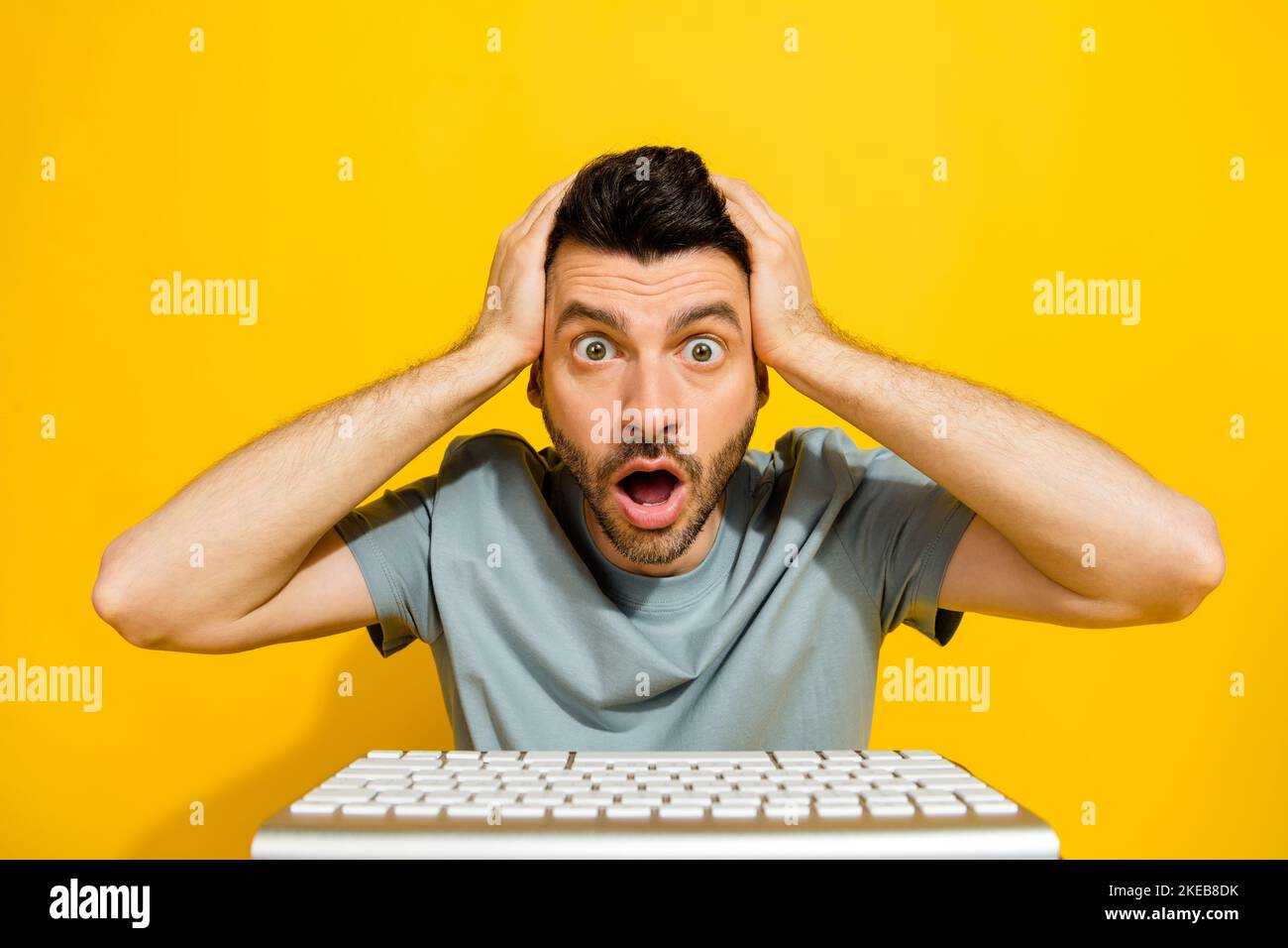 Closeup photo of young crazy smart it developer excited touching head ...