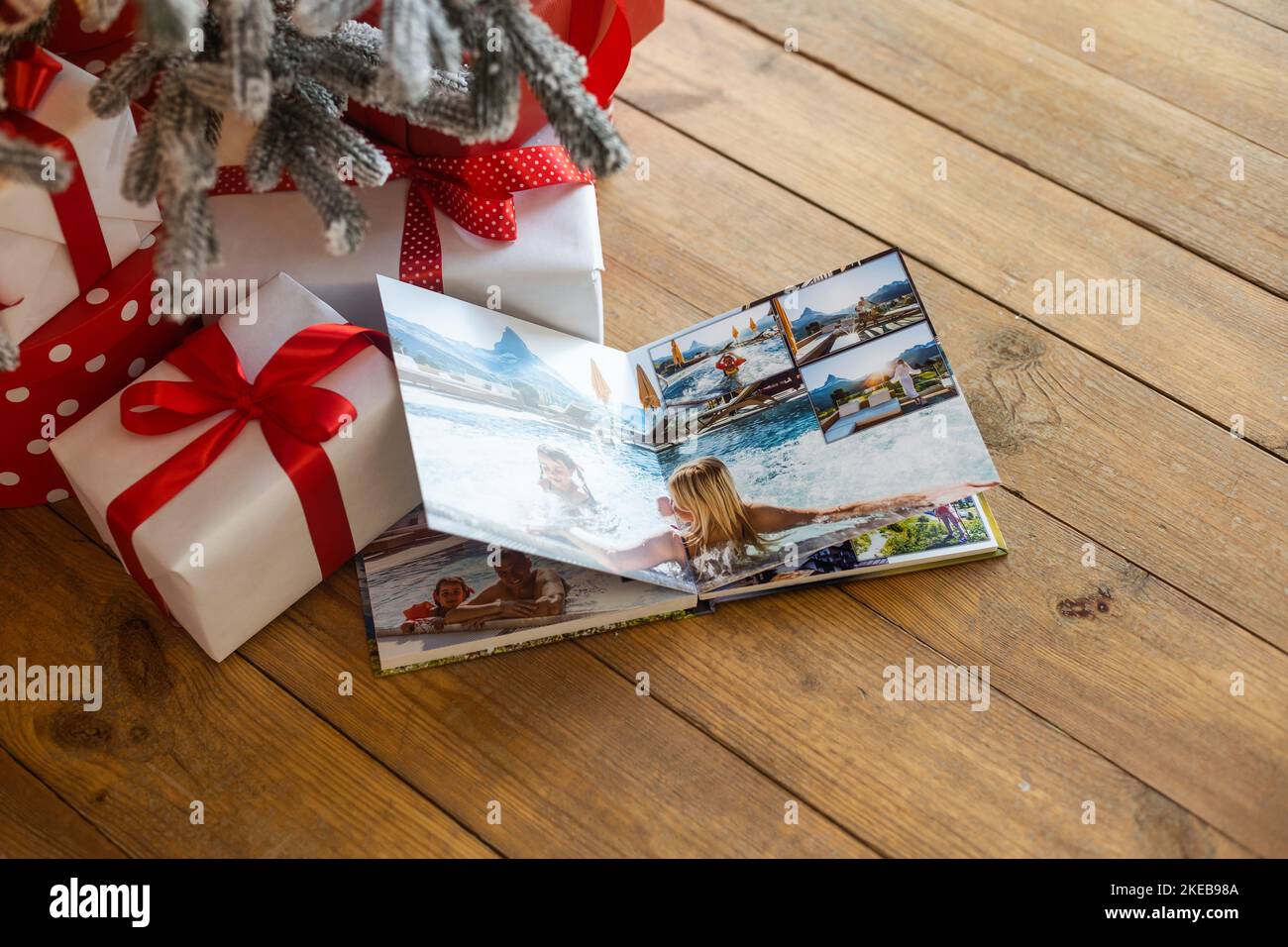 a Photobook of family.Photobook is gift. photo album next to gifts ...