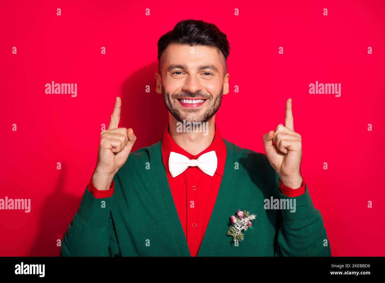Portrait of positive elegant guy beaming smile direct fingers up empty ...