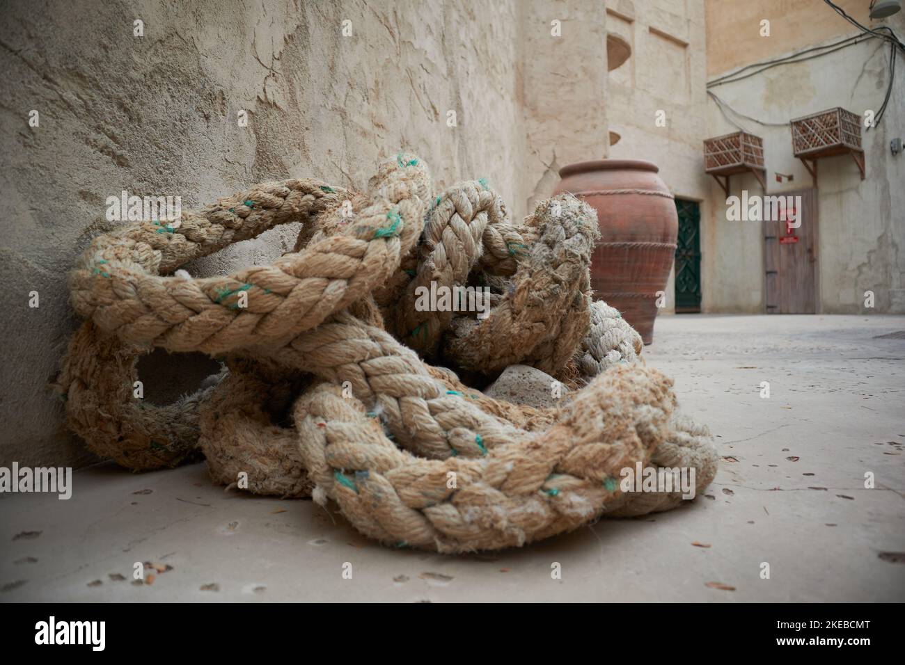 Old Rope resting on street of Al Seef Dubai UAE Stock Photo - Alamy